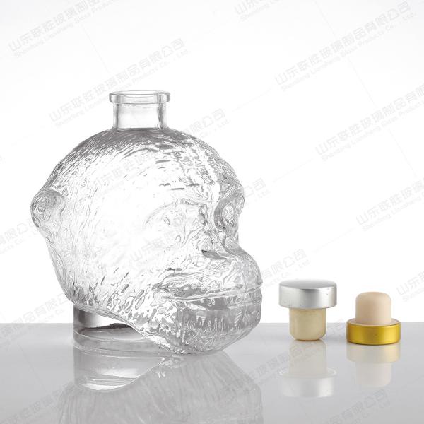 Quality Clear 1000ml Large Size Ape Head Shape Vodka Glass Bottle for Beverage Packaging for sale