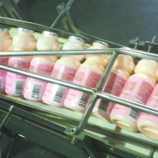 Quality 380V Grouping Automatic Screw Feeder Machine Collective Milk Packaging Line for sale