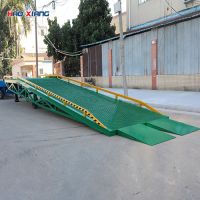 Quality Green Hydraulic Dock Ramp Portable Truck Loading Ramp For Handling Cargo for sale