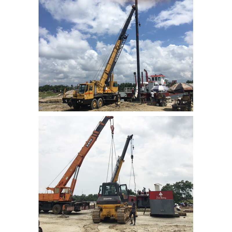 Technical team installing dredger components