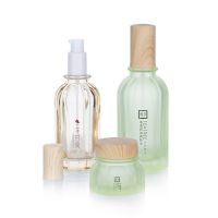 Quality 130ml/50g Glass Yellow/Green Transparent Cylindrical Smooth With Bamboo Lid For Cosmetic Packaging Bottle for sale