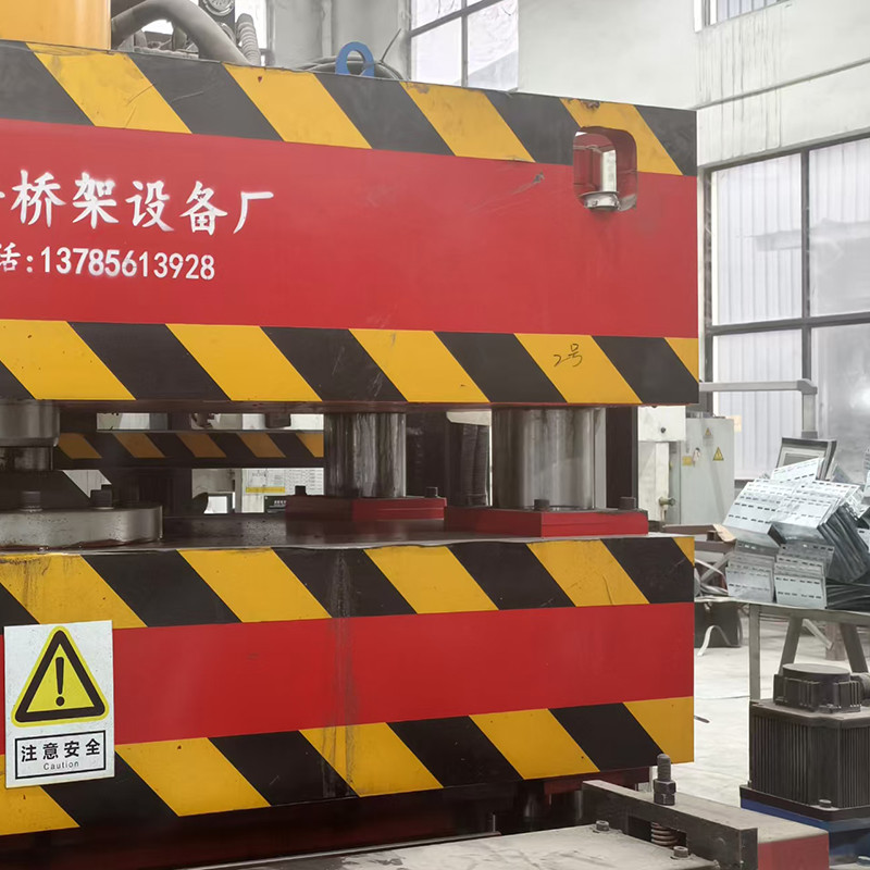 Molded cable tray manufacturing machine in operation