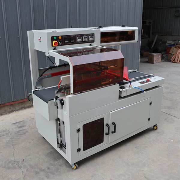 Quality 220V / 50Hz Fully Automatic Shrink Wrapping Machine Pneumatic Packaging Machine for sale