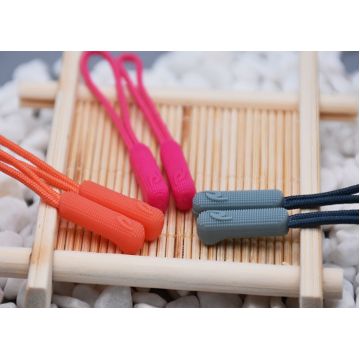 Quality 3D Embossed Plastic Zipper Puller With Polyester String For Garments for sale