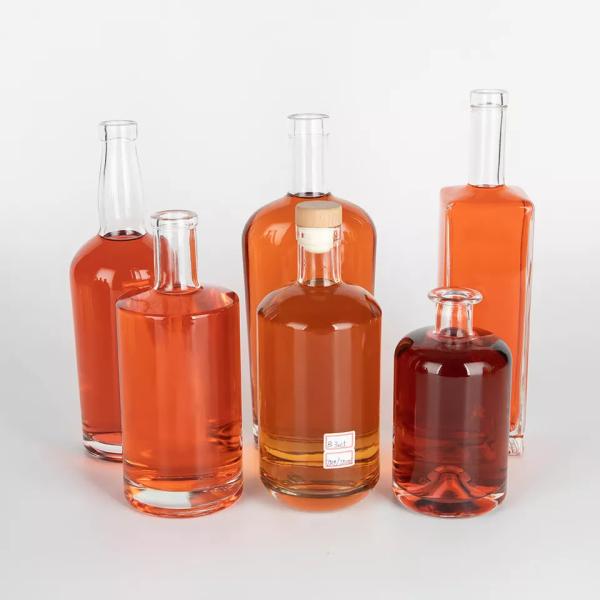 Quality Custom Color 750ml Transparent Round Wide Mouth Glass Liquor Bottle for Wine for sale
