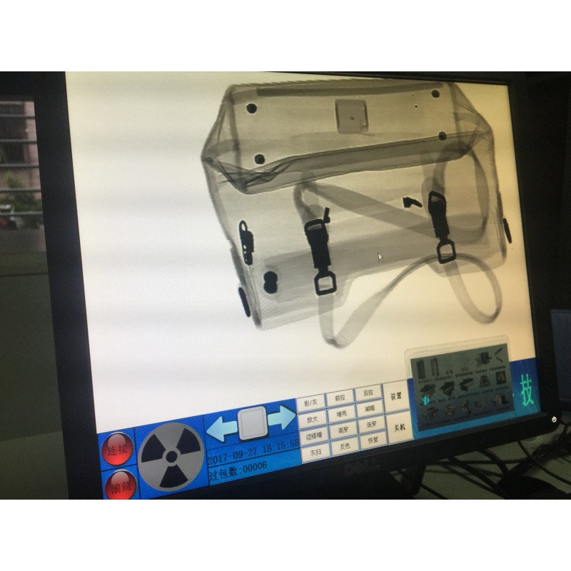 X-Ray Baggage Scanner side view displaying control panel and system components