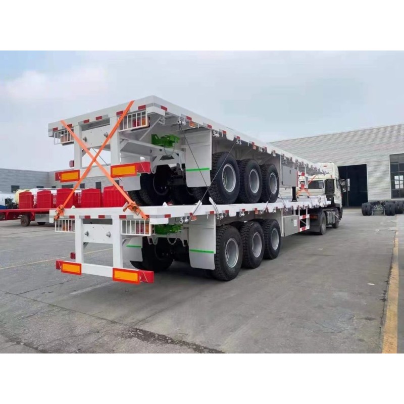China Top Supplier 3 Axle Flatbed/Platform Semi Trailer for 20 FT/40FT/45FT Container Cargo Transport