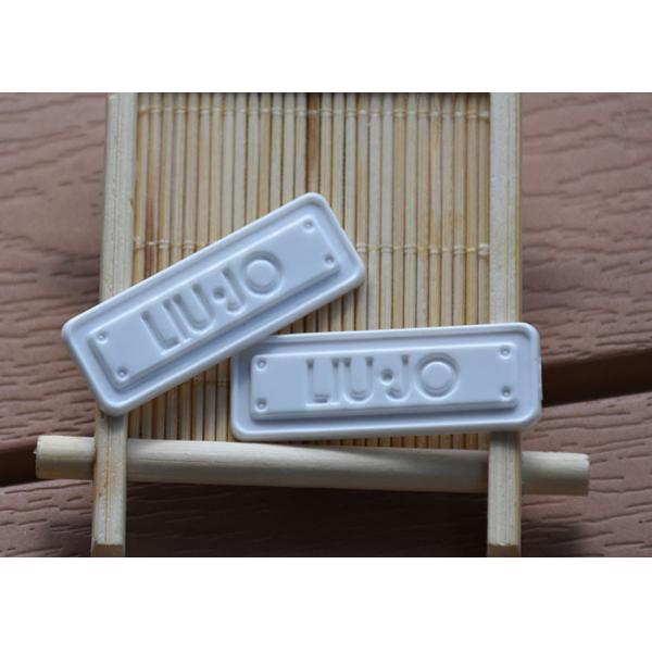 Quality Degradable 2mm garment TPU Clothing Labels With Mould Embossed Logo for sale