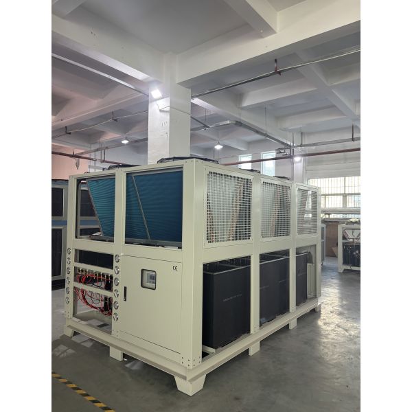 Quality 40HP Air Cooled Screw Type Chiller featuring screw compressor and heat exchange system for continuous cooling in large facilities for sale