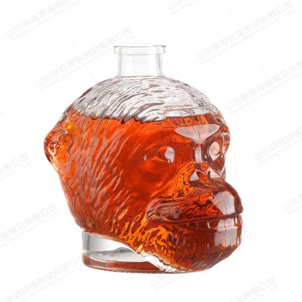 Quality Clear 1000ml Large Size Ape Head Shape Vodka Glass Bottle for Beverage Packaging for sale