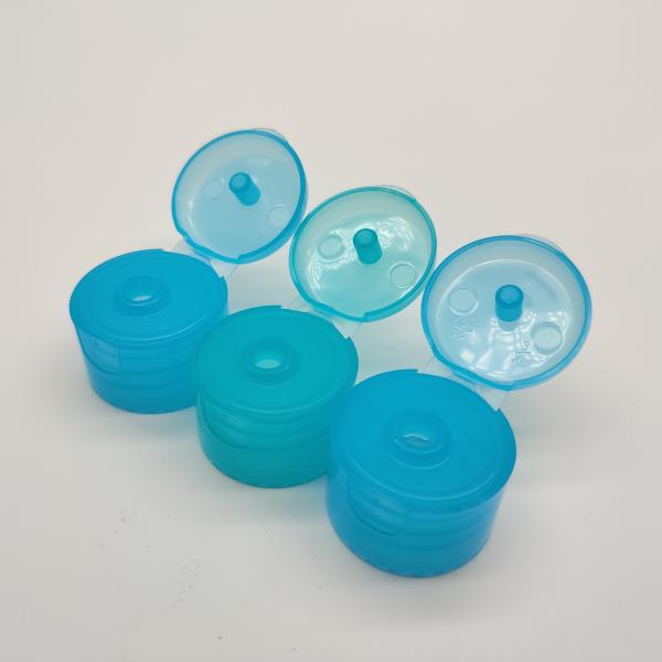 Quality Round Top 28/410 blue Plastic Flip Top Cap For Lotion Bottle for sale