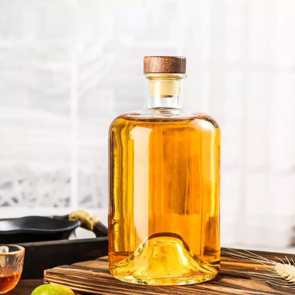 Quality Custom Color 750ml Transparent Round Wide Mouth Glass Liquor Bottle for Wine Vodka Gin for sale