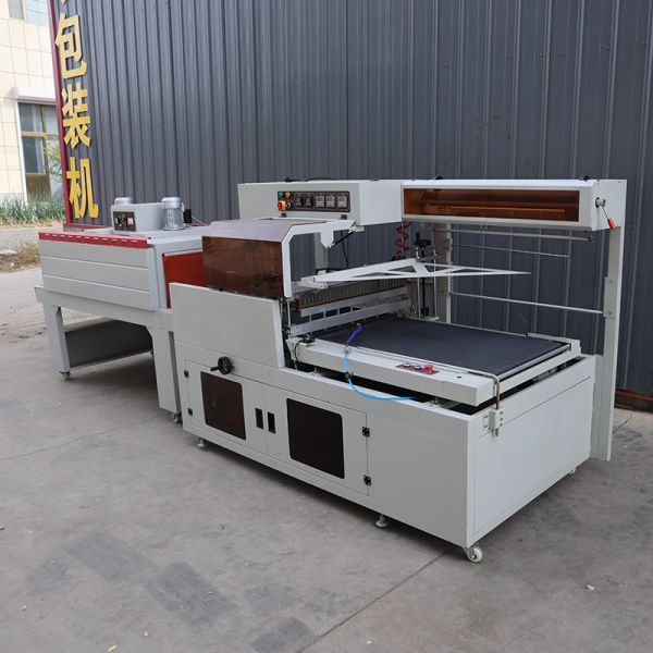 Quality Heat Shrink Industrial Plastic Wrap Packaging Machine Fully Automatic PLC Controlled for sale