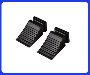 Close-up of wheel alignment components on car lift