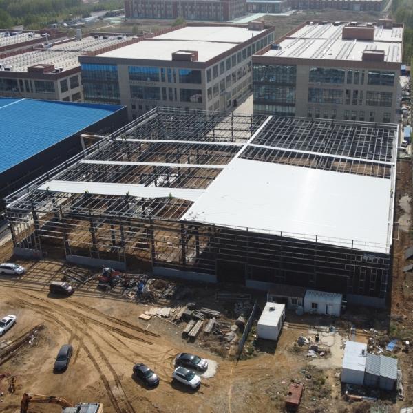 Quality Arch Roof Steel Frame Building with H-Section Beams 50-Year Lifespan for sale
