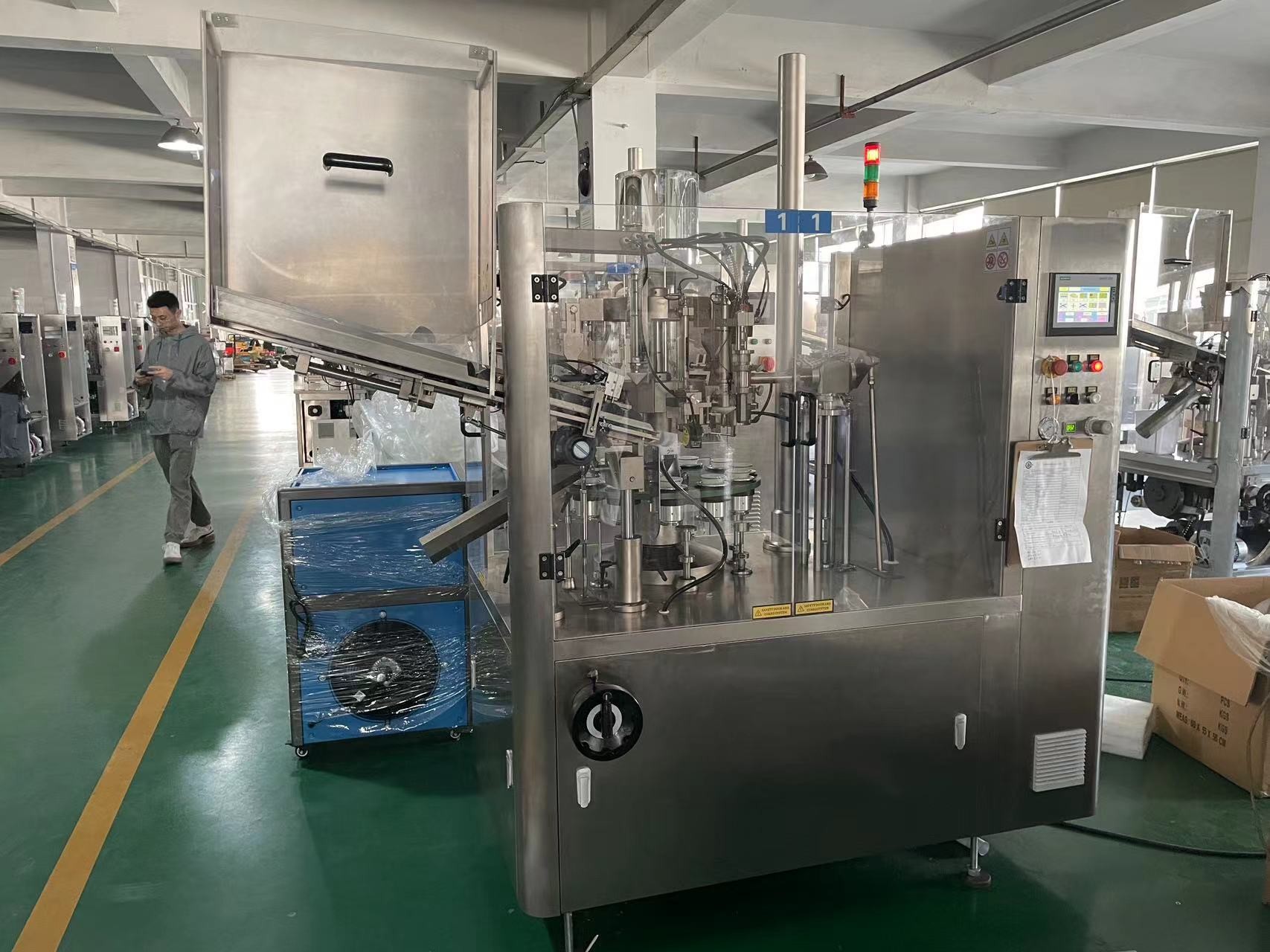 Tube filling machine front view