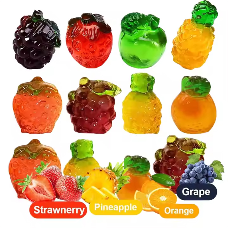 Assorted 3D/4D fruit-shaped gummy candies in bulk packaging