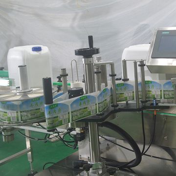 Quality 20L Drum Filler Olive Oil Filling Machine with 4 Filling Heads and 1 Capping for sale