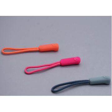 Quality 3D Embossed Plastic Zipper Puller With Polyester String For Garments for sale