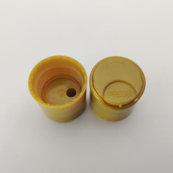 Quality Polypropylene 24mm Yellow Disc Top Cap For Shampoo Bottle for sale
