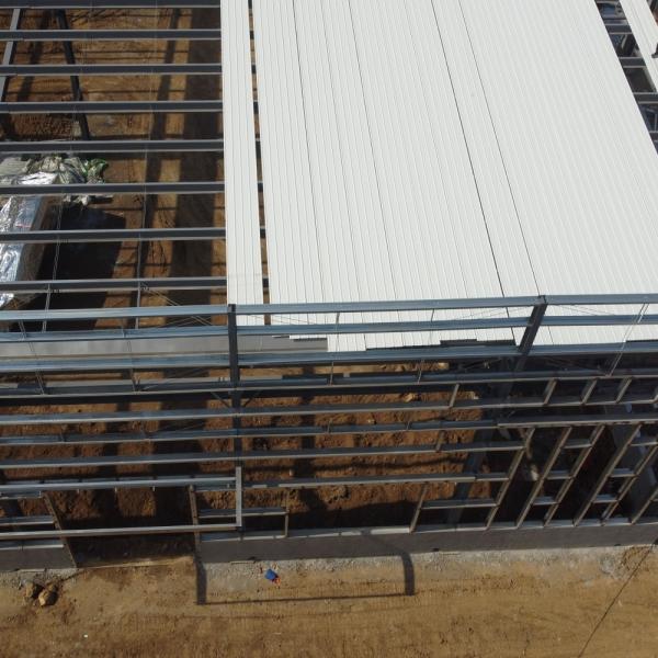 Quality Arch Roof Steel Frame Building with H-Section Beams 50-Year Lifespan for sale