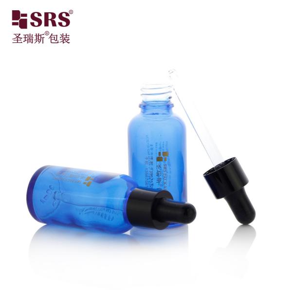 Quality D001-50ml Coating Blue Translucent Glass Essential Oil Bottle With Glossy Black for sale