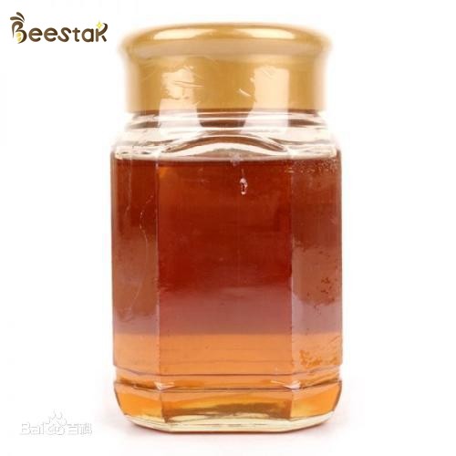 Quality 100% Pure Raw Natural Bee Honey with Amber Color and 76.5% Reduce Sugar for sale
