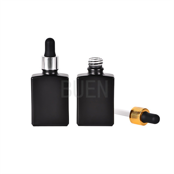 Quality Cosmetic Packaging Glass Dropper Bottle Frosted Black Customized for sale