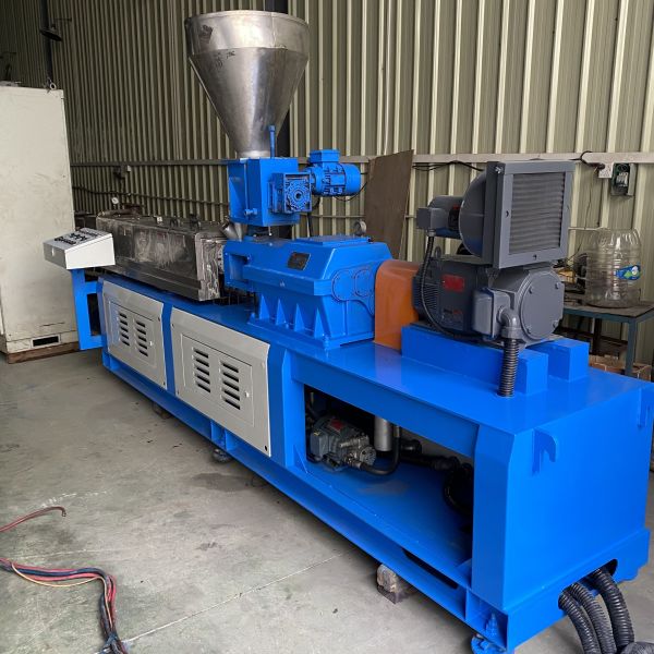 Quality Used 65-barrel twin-screw extruder for sale