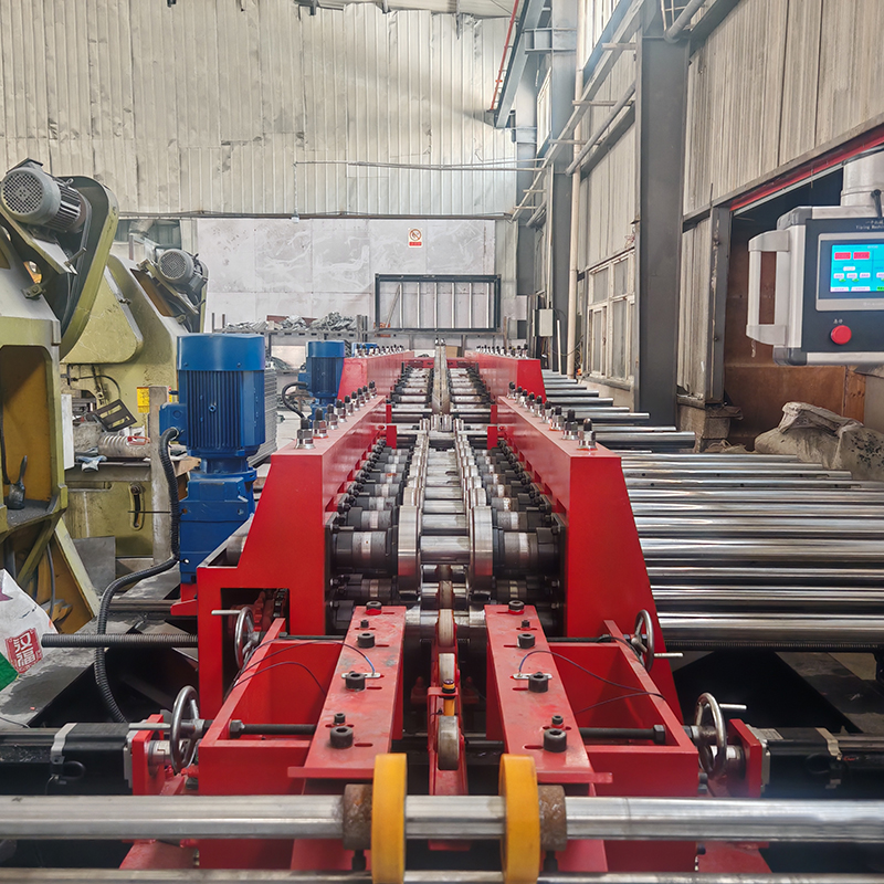 Close-up view of cable tray production equipment components