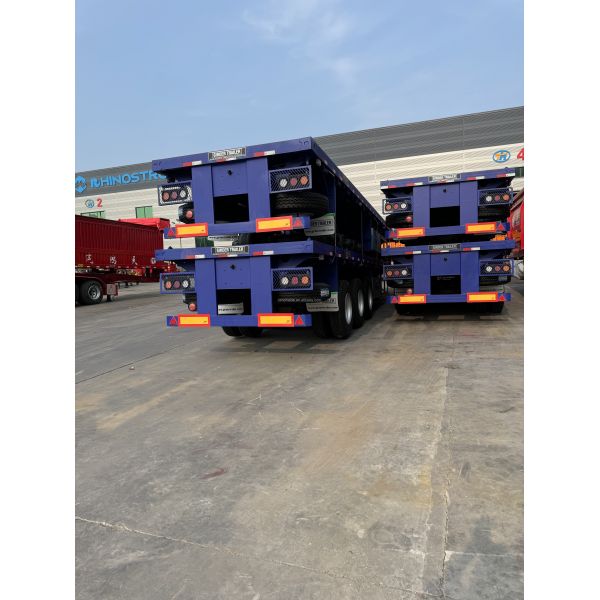 Quality 100T Maximum Load Capacity Flatbed Container Semi-Trailer with Mechanical for sale
