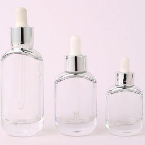 Quality Oval Glass Empty Dropper Bottles Clear Skin Care Essential Oil Customized Logo for sale