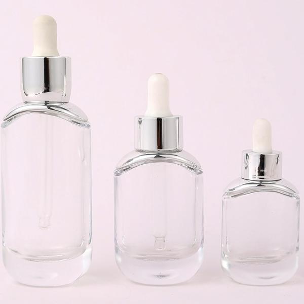 Quality Oval Glass Empty Dropper Bottles Clear Skin Care Essential Oil Customized Logo for sale