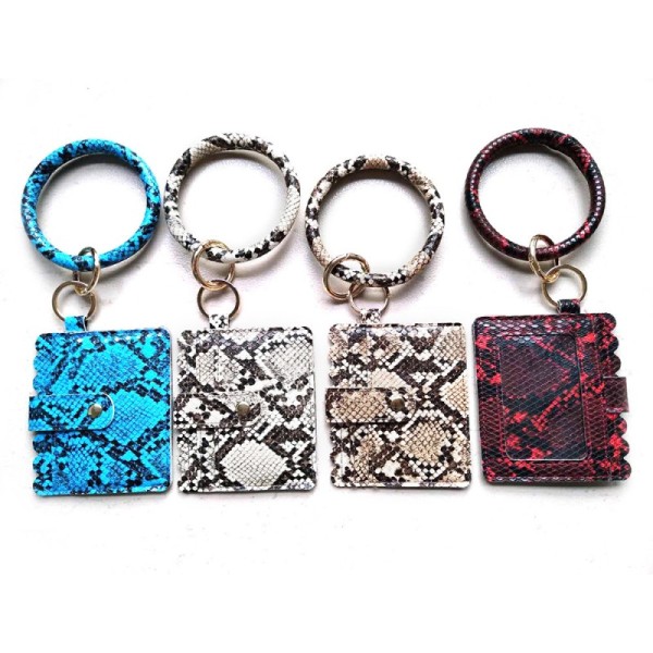 Quality Girls Debossed Logo Cute Wristlet Keychain , 9.5cm Bangle Wristlet Keychain for sale