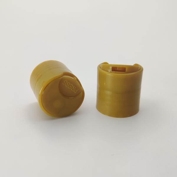 Quality Polypropylene 24mm Yellow Disc Top Cap For Shampoo Bottle for sale