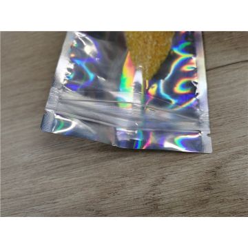 Quality 0.5OZ Holographic Stand Up Pouch Silver ziplockk Foil Bag Pouches With Tear for sale