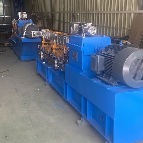 Quality Used 65-barrel twin-screw extruder for sale