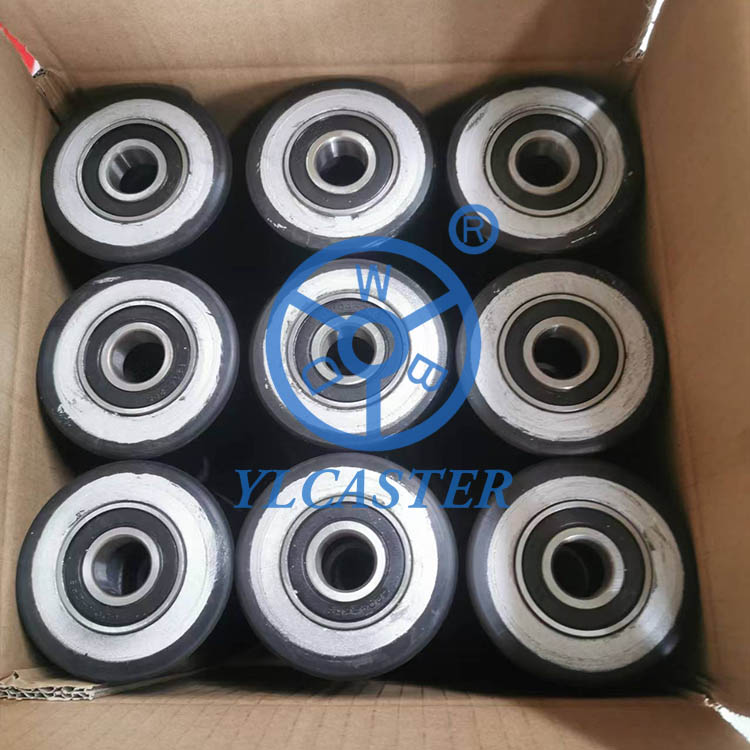 Black iron polyurethane pallet truck wheels with ball bearings packaged in carton -YLcaster