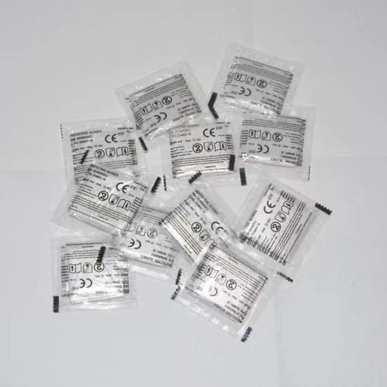 Servo Driven 1 Pair CPE Glove Folding Packing Machine 4 Side Plastic Film Pack 7