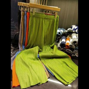 Quality Spring 2025 Women's Loose Solid Color Pleated Elastic Plus Size Women's Pants for sale
