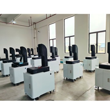 Precision optical component processing station with technical staff