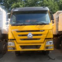 Quality 21-30t Load Capacity Heavy Duty HOWO Dump Truck with Tyres and Sta Electric for sale