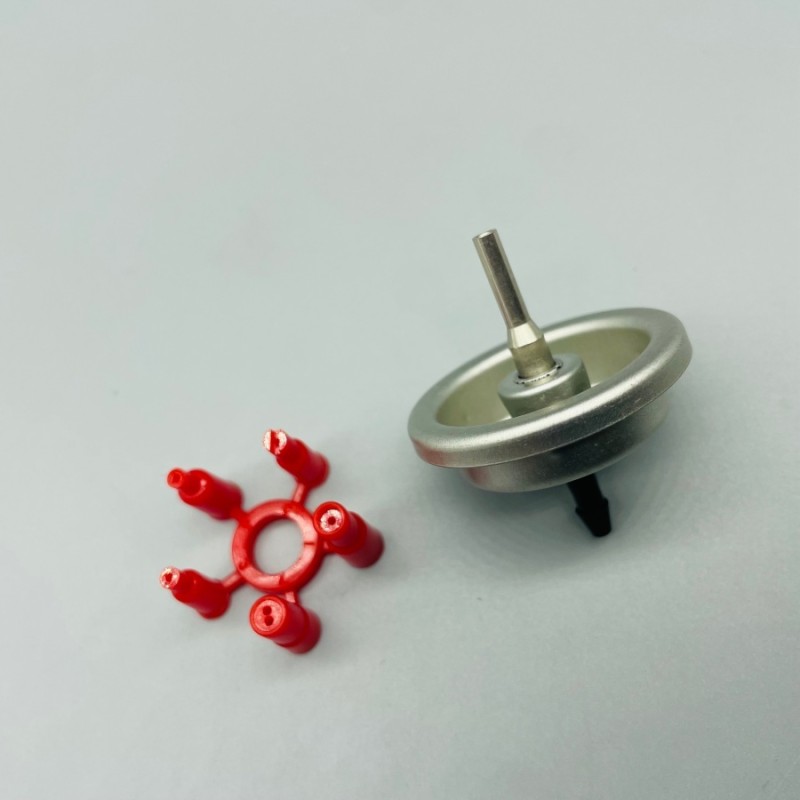 Close-up view of versatile refillable lighter valve adapter showing detailed construction