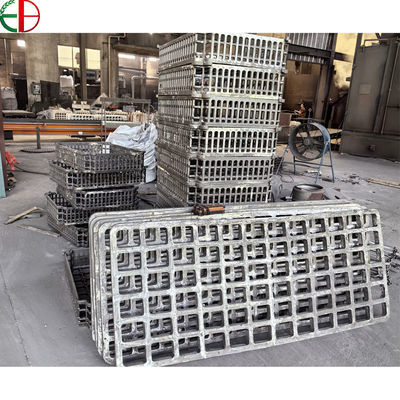 EB Castings reference photograph showing custom cast furnace frames and grid trays for industrial heat treatment applications