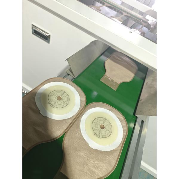 Quality colostomy ostomy bags making machine 5 layers with activated carbon for sale