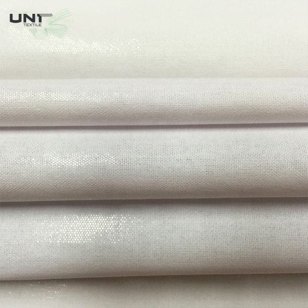 Quality Double Dot PA Coated 100% Polyester Shirt Interlining with Shrinkage Resistance for sale