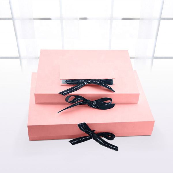 Quality Book Shape Debossing Magnetic Garment Packaging Boxes With Ribbon for sale