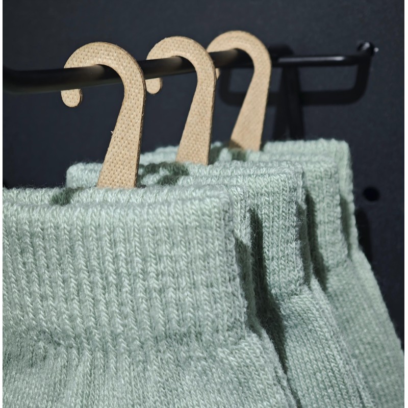 Close-up of cardboard hanger hook