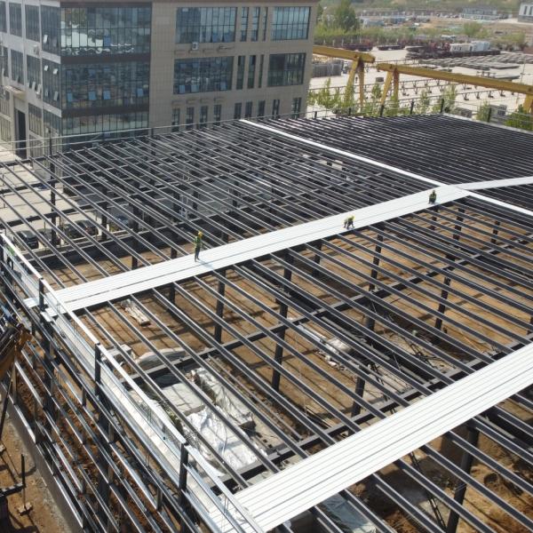 Quality Arch Roof Steel Frame Building with H-Section Beams 50-Year Lifespan for sale