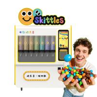 Quality Sweet Treat Dispenser Vending Machine with Robotic Arm Dispensing Method in for sale